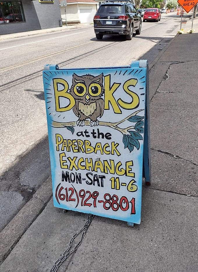 This charming sidewalk sign featuring a wise owl knows exactly how to lure book lovers off the street.