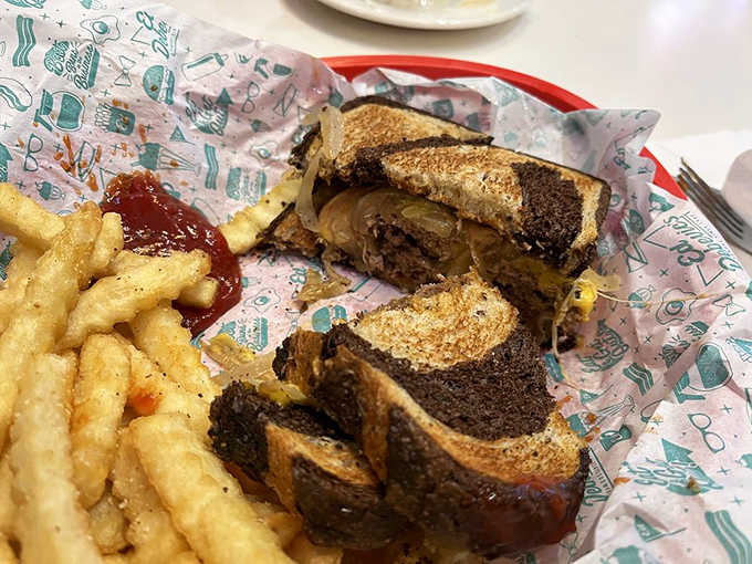 The patty melt on marbled rye proves that some sandwiches are worth the inevitable food coma that follows consumption.