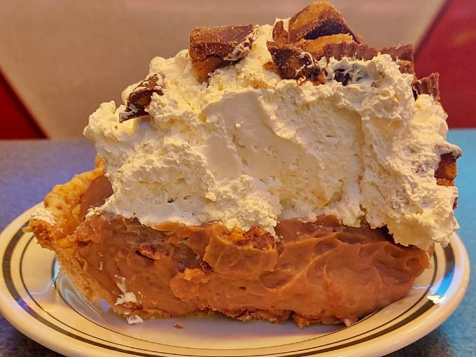 Peanut butter pie with a cloud of whipped cream so perfect it makes you wonder why anyone bothers with birthday cake anymore.