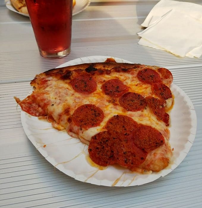 Pepperoni perfection on paper plates &ndash; the classic gaming fuel that's powered arcade champions since the dawn of the digital age.