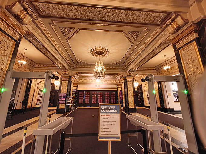 Modern security meets historic elegance – even the screening area can't diminish the grandeur of this entrance hall.