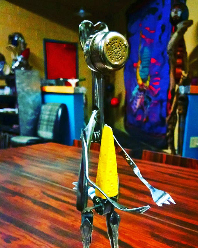 This whimsical creature, crafted entirely from silverware, proves that even your dining utensils harbor secret artistic potential.