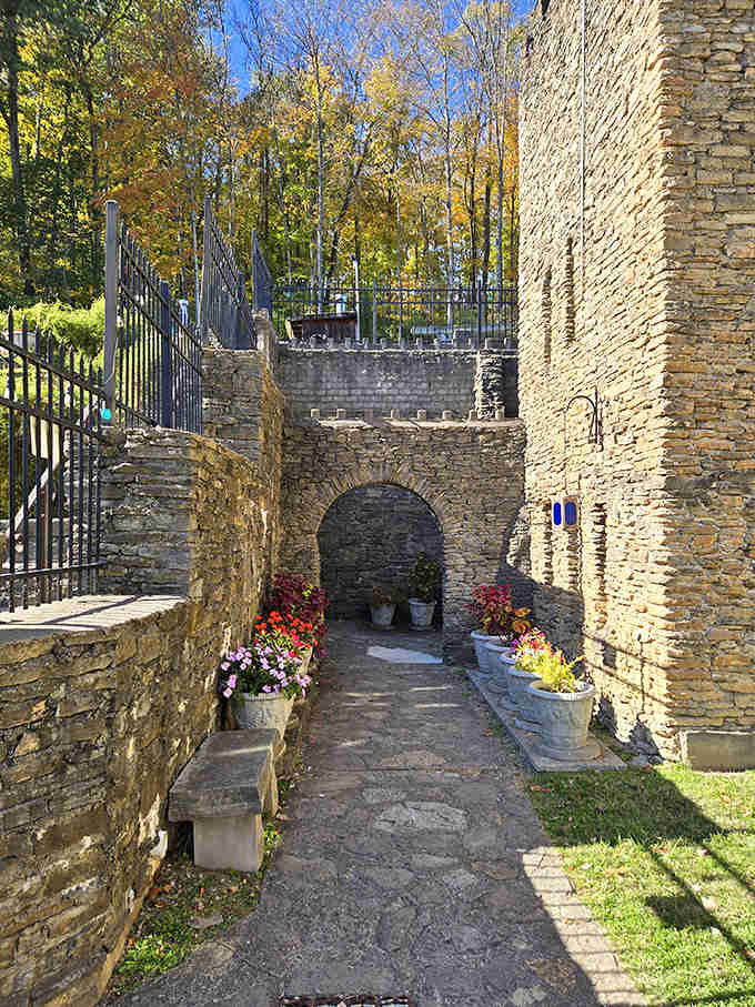 Stone pathways wind through the castle grounds, each turn revealing new perspectives of this architectural marvel.