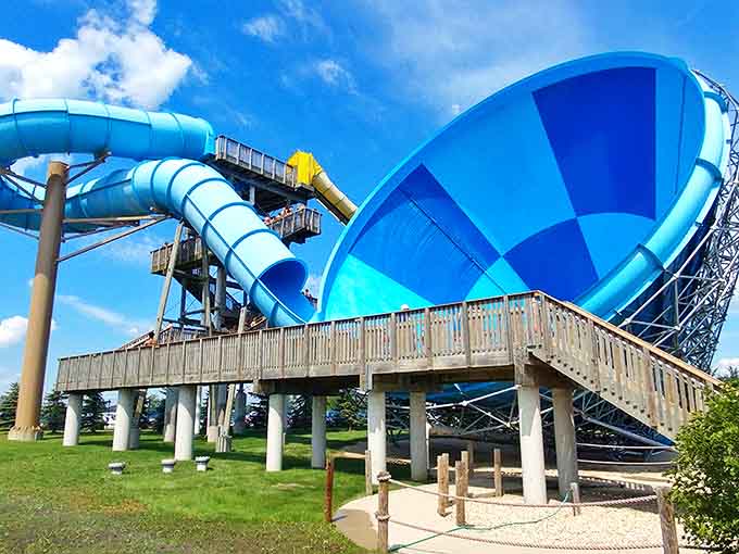 The Boomerang stands tall against azure skies &ndash; a monument to physics, fun, and that moment when your stomach stays at the top.