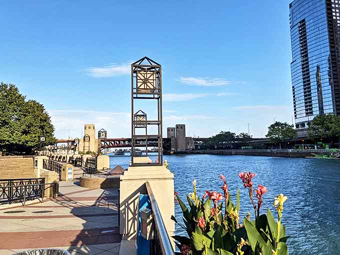Sunset transforms the riverfront into a golden corridor, as the day's last light catches glass facades and turns the water into a shimmering ribbon.