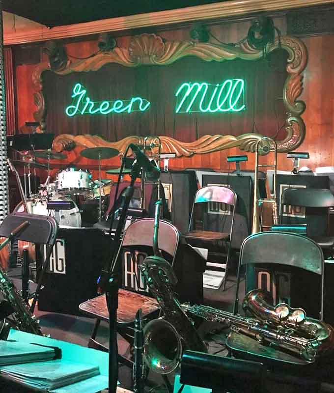 Between sets, the empty stage holds its breath, instruments waiting patiently for their human counterparts to return.