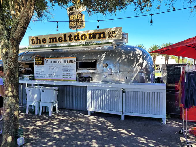 The Meltdown on 30A elevates grilled cheese to an art form, their silver Airstream housing a temple dedicated to melted dairy perfection.