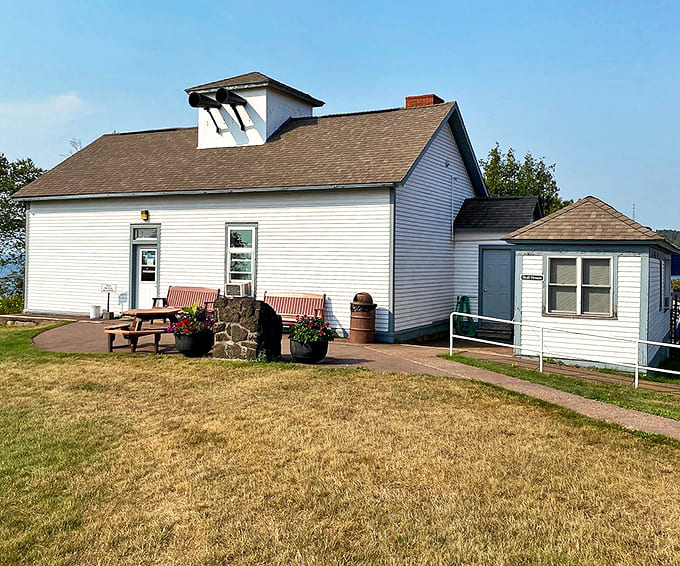 The lighthouse complex includes several historic buildings, each telling part of the story of life at this remote but vital maritime outpost.