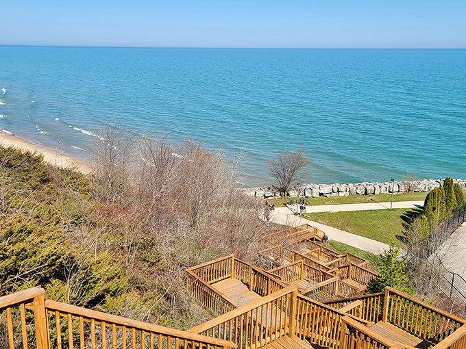 Wooden staircases and viewing platforms at the lakefront offer breathtaking vistas that change with each season.