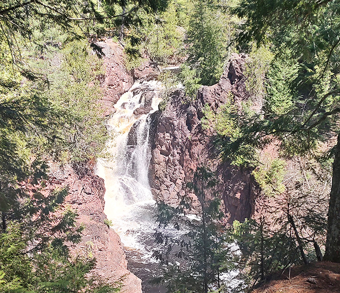 Sunlight catching the mist creates nature's own diamond factory&mdash;no mining required, just pure Wisconsin magic.