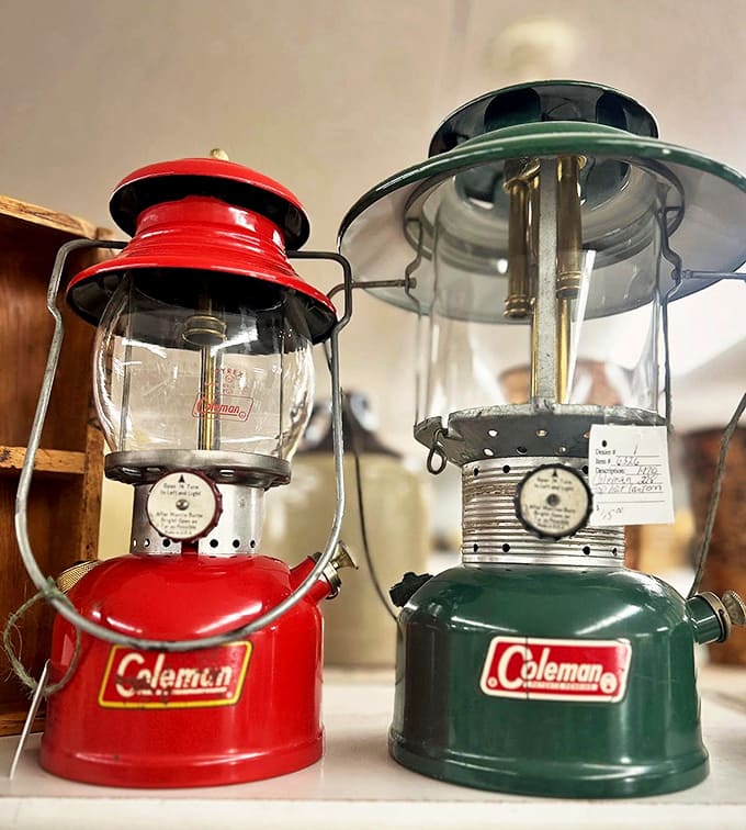 These vintage Coleman lanterns once illuminated family camping trips and fishing expeditions, their warm glow ready to light up new adventures.