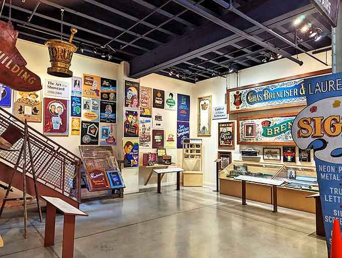 This wall of commercial art shows how yesterday's advertisements have become today's treasures, each poster a time capsule of American desires.