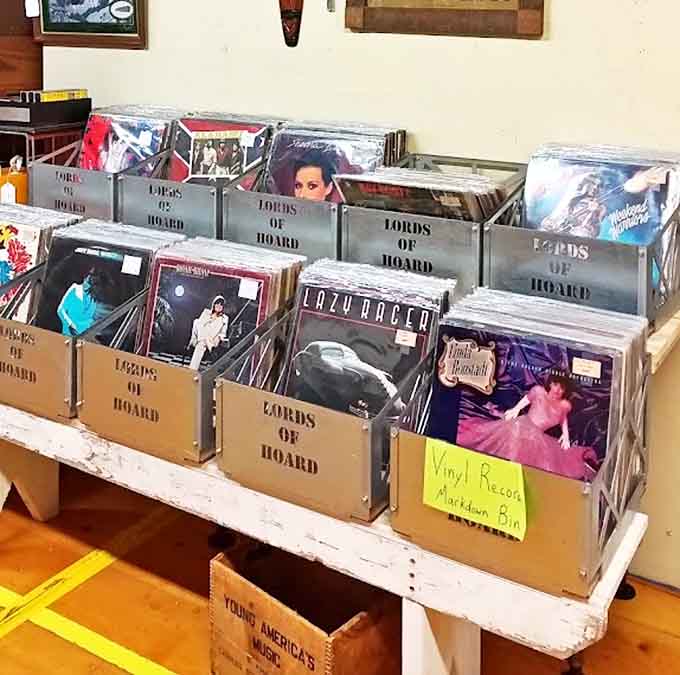 Vinyl treasures await in carefully labeled boxes—each album cover art more expressive than any digital playlist could ever hope to be.