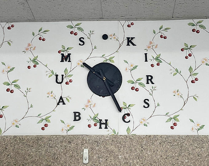 The cherry-themed clock reminds visitors that at Kirschbaum's, it's always time for something delicious.