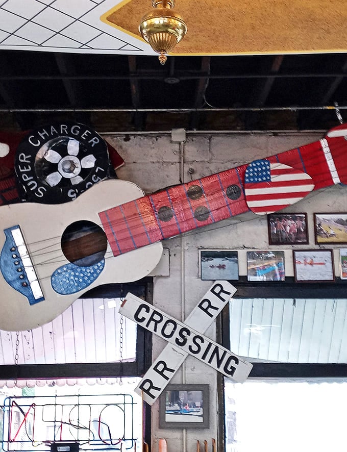 This patriotic guitar and railroad crossing sign capture the all-American spirit of turning ordinary materials into extraordinary (if short-lived) adventures.