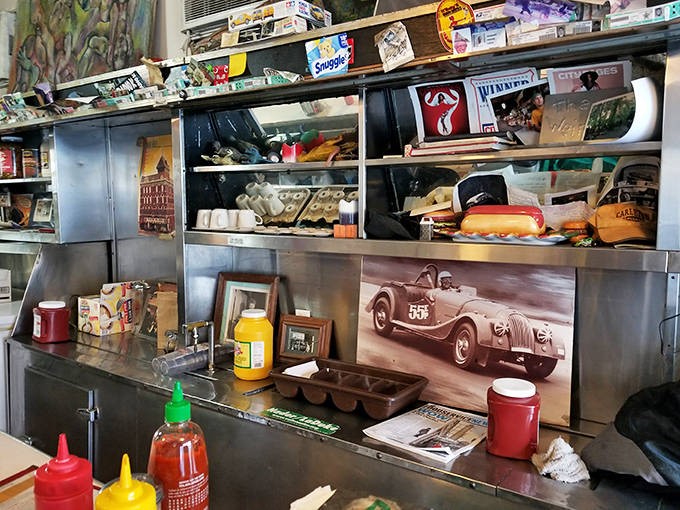 Behind the counter, where the magic happens &ndash; condiment bottles stand at attention, ready to transform simple ingredients into culinary memories.