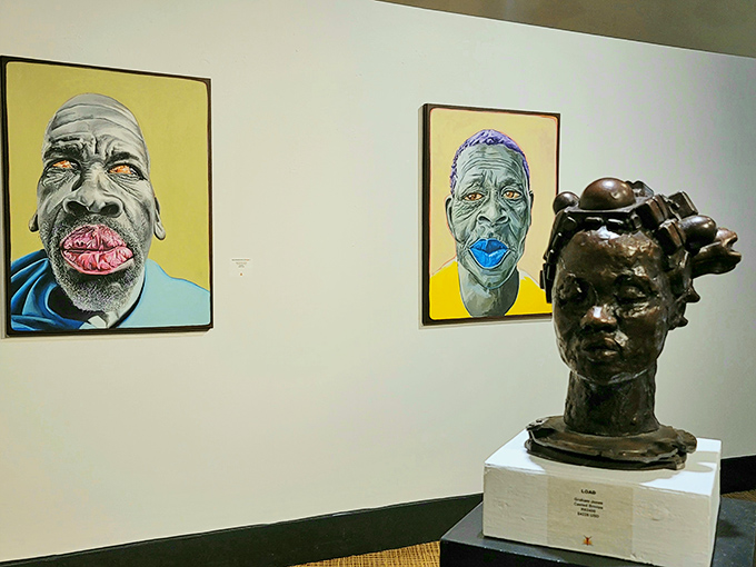 Bold portraits and sculptures in the gallery spaces challenge viewers while celebrating artistic expressions of identity and community.