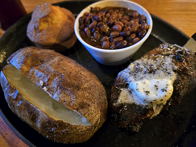 Baked potatoes so perfectly executed they deserve their own spotlight &ndash; crispy-skinned vessels cradling fluffy interiors and savory companions.