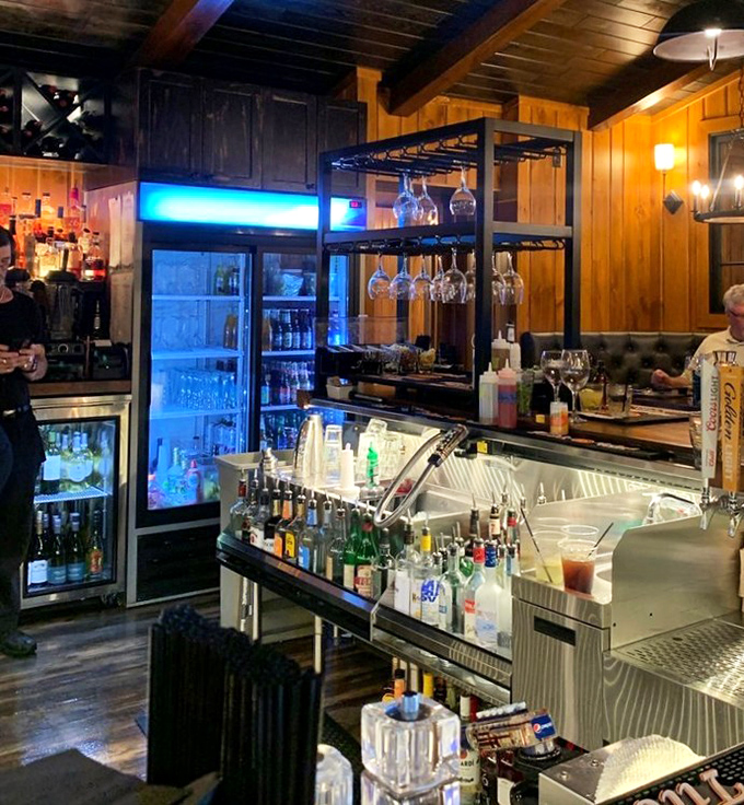 The bar gleams with promise and possibility &ndash; where skilled hands craft drinks that complement rather than compete with the exceptional food.