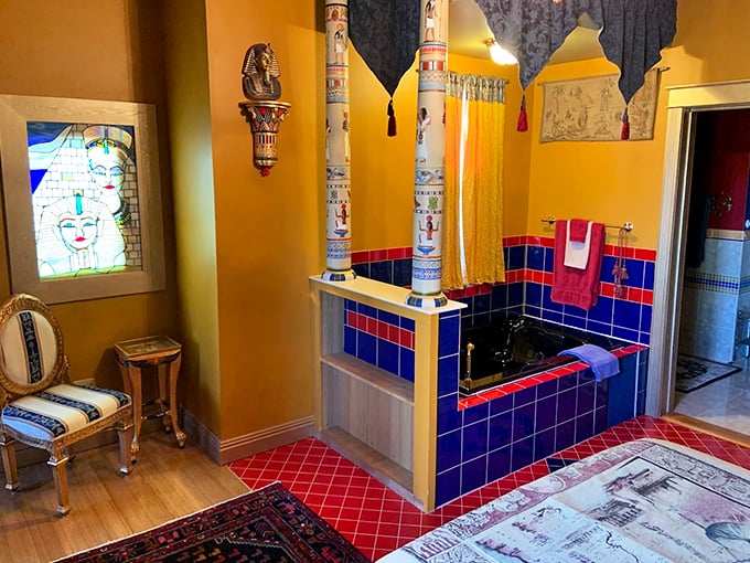 Even the bathrooms maintain the thematic integrity with vibrant tiles, decorative columns, and royal touches that elevate ordinary functions to extraordinary experiences.