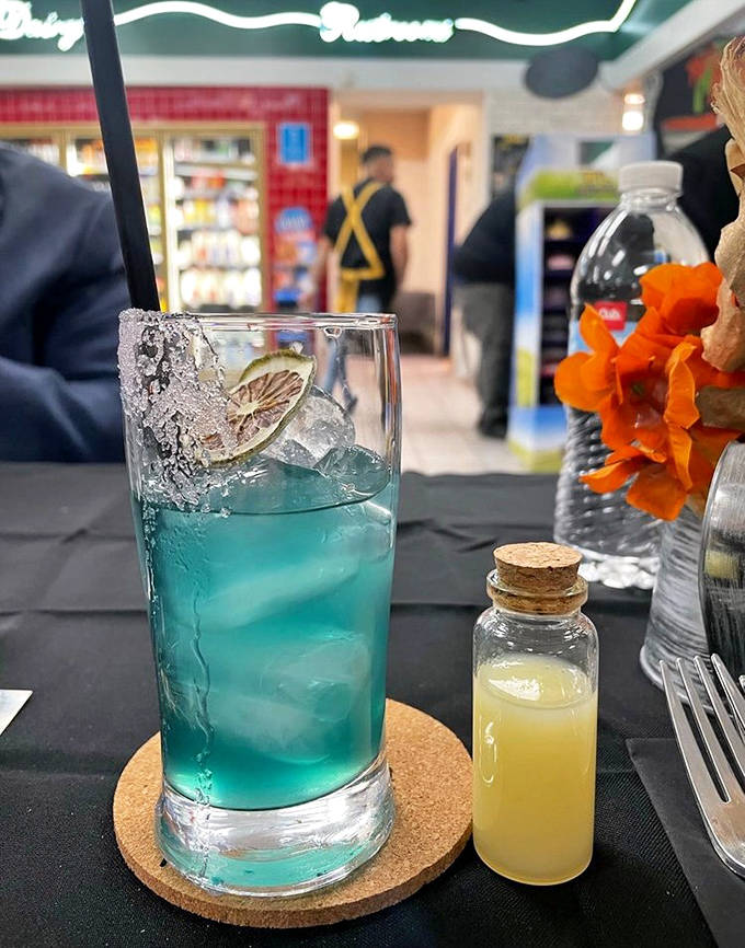 Electric blue refreshment with a lime garnish &ndash; the perfect cooling counterpoint to spicy tacos on a Minnesota afternoon.