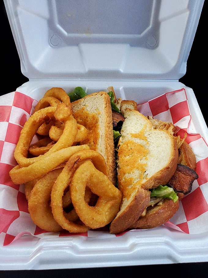 A hearty sandwich with onion rings &ndash; the perfect pre-pie meal for those who believe in balanced indulgence.