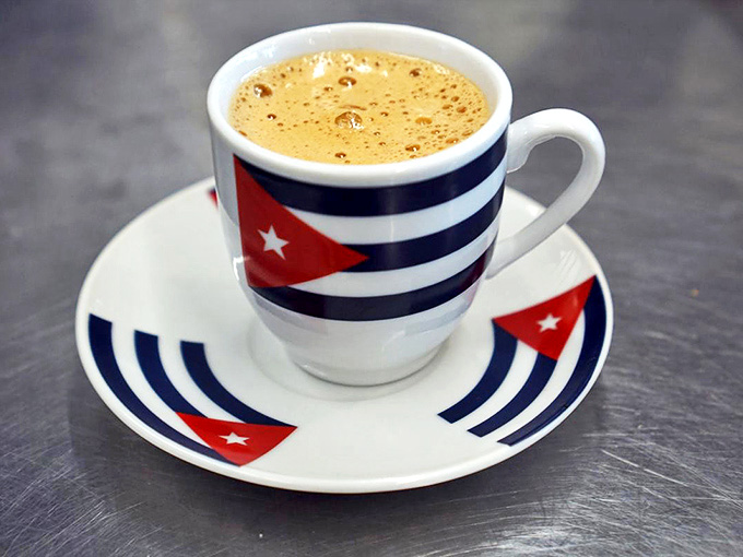 That Cuban coffee comes in a patriotic cup that's small in size but mighty in flavor &ndash; like a caffeinated hand grenade of happiness.