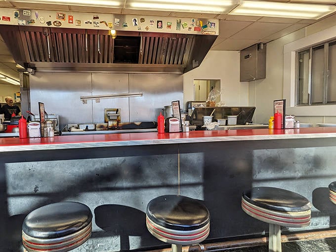 The counter seating offers front-row tickets to the culinary show &ndash; these well-worn stools have supported generations of hungry Minnesotans seeking burger bliss.