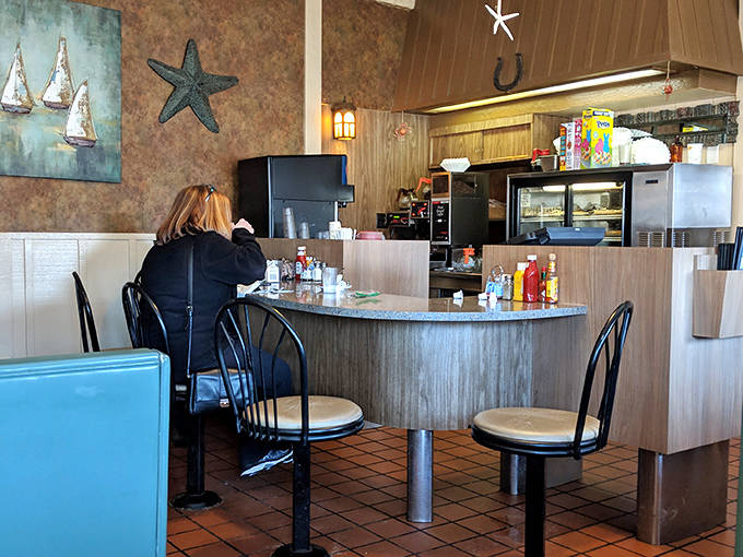 Counter seating &ndash; where solo diners become temporary family and the pie selection process gets the attention it deserves.