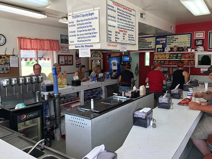 Locals line the counter like they have for generations, participating in a culinary ritual that connects them to decades of Austin dining history.