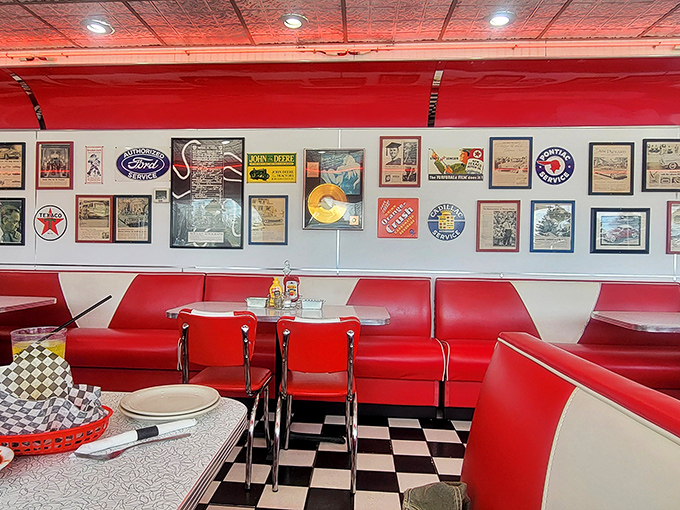 The checkerboard floor practically dares you not to smile as you walk across it toward your red vinyl throne.