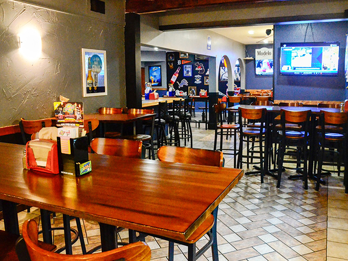 The dining area strikes that perfect balance between "nice enough for a date" and "comfortable enough to lick your fingers without judgment."