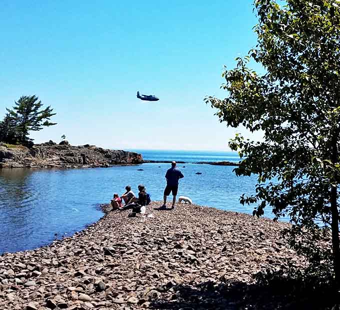 Nature's playground where memories are made, as families discover the simple joy of skipping stones across crystal waters.