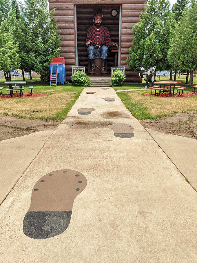 Follow in Paul's footsteps &ndash; literally &ndash; as these oversized concrete prints lead visitors to the talking giant's cabin home.
