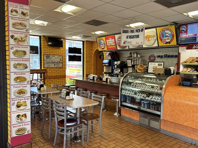 The counter-and-table setup creates that perfect diner vibe where conversations flow as freely as the coffee.