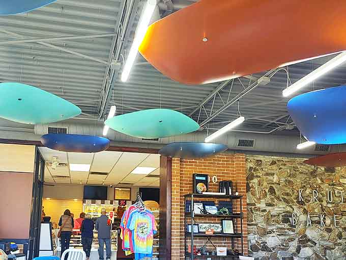 Colorful ceiling panels float like abstract surfboards, bringing unexpected modern flair to this century-old temple of traditional baking.