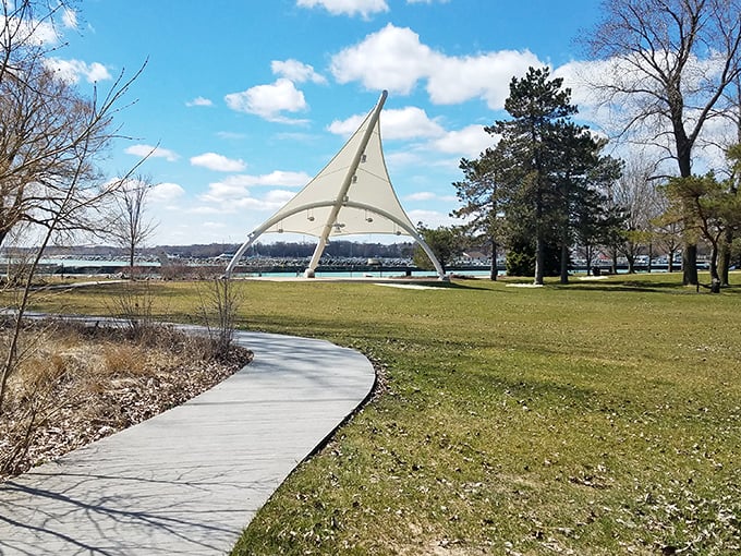 Green spaces buffer the beach from parking areas, creating that perfect transition zone between civilization and natural splendor.
