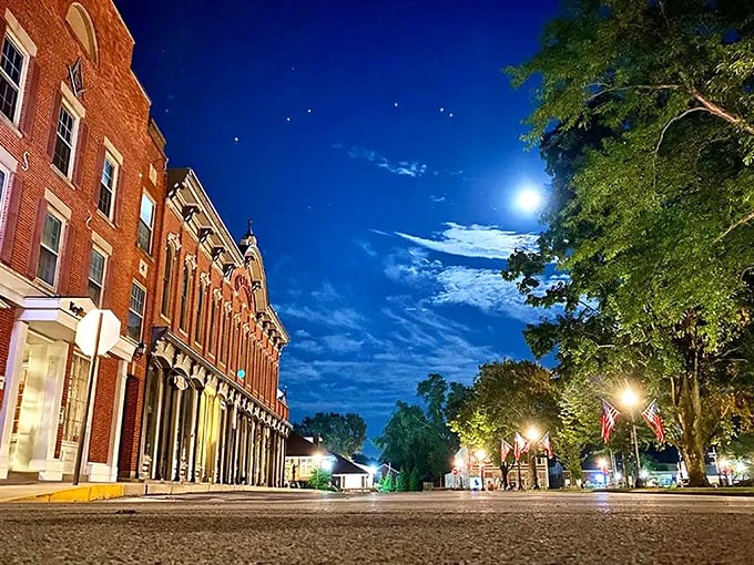 Main Street under moonlight transforms into a magical scene where you half-expect to see Thomas Edison himself strolling by.