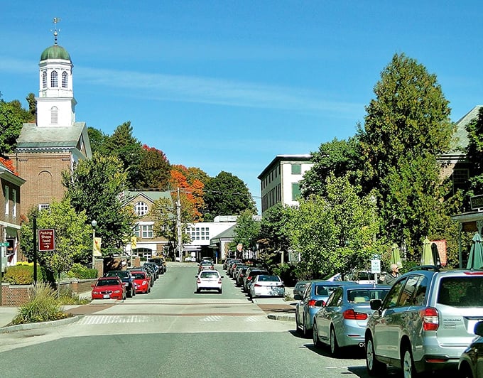 Main Street's charm is amplified by the distinctive green dome of the town hall, watching over the bustling activity below like a benevolent guardian.