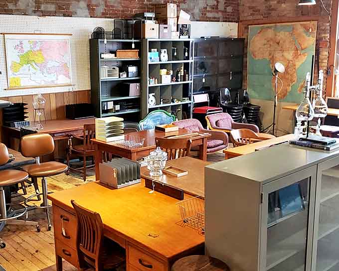 This academic corner feels like a professor's office frozen in time, complete with vintage maps and sturdy wooden desks built for serious thinking.