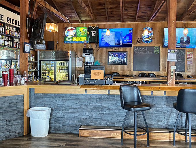 The bar area invites sports fans and pickle enthusiasts alike to gather, watch the game, and discover why pickles and beer are soulmates.