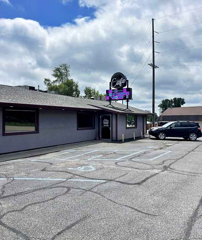 The exterior view shows a cafe that's been serving the community with pride, no fancy facade needed when the food speaks volumes.