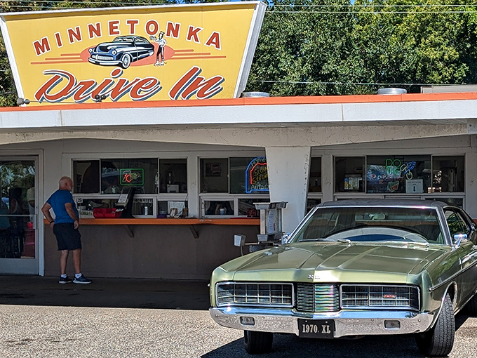 Sunny vibes at Minnetonka Drive In, classic cars, friendly smiles, and nostalgic flavors making Spring Park, Minnesota feel timeless today.
