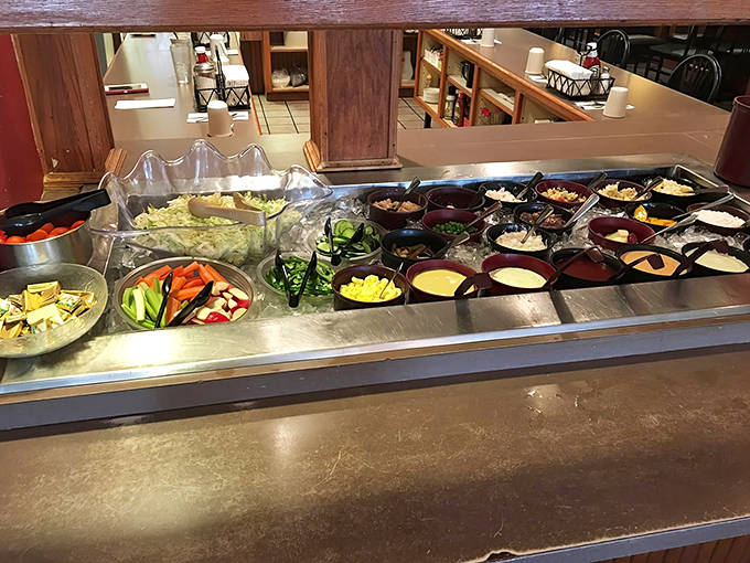 A salad bar that remembers when "fresh" actually meant something, offering redemption before the inevitable pie indulgence.