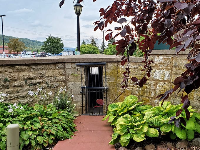 Peering through these iron bars offers a sobering reminder of the old prison walls that once stood right outside.