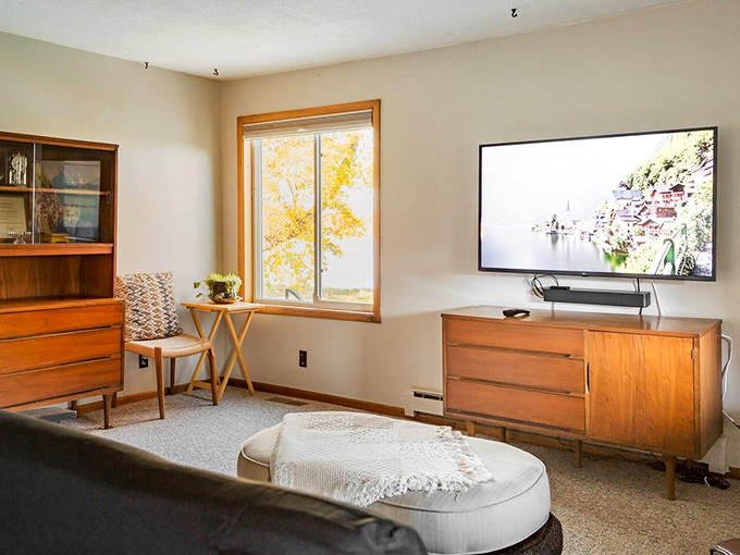 Modern entertainment meets vintage charm in this living area where you'll probably ignore the TV in favor of the window views.