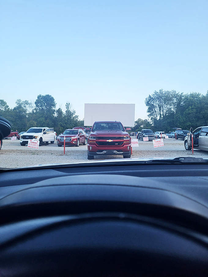 The dashboard view every movie lover cherishes &ndash; framing the massive screen through windshields as stories unfold under starlight.