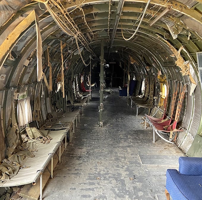 The airplane's stripped interior reveals its military transport past &ndash; a fascinating glimpse into aviation history parked right on the front lawn.