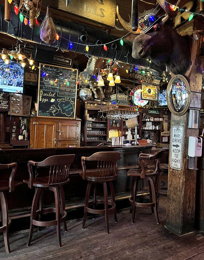 Bar stools await patrons at the well-worn counter, each one having supported decades of stories, celebrations, and commiserations.