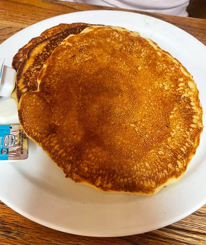 Pancakes the size of dinner plates with the perfect golden hue. Maple syrup's favorite landing pad has arrived.